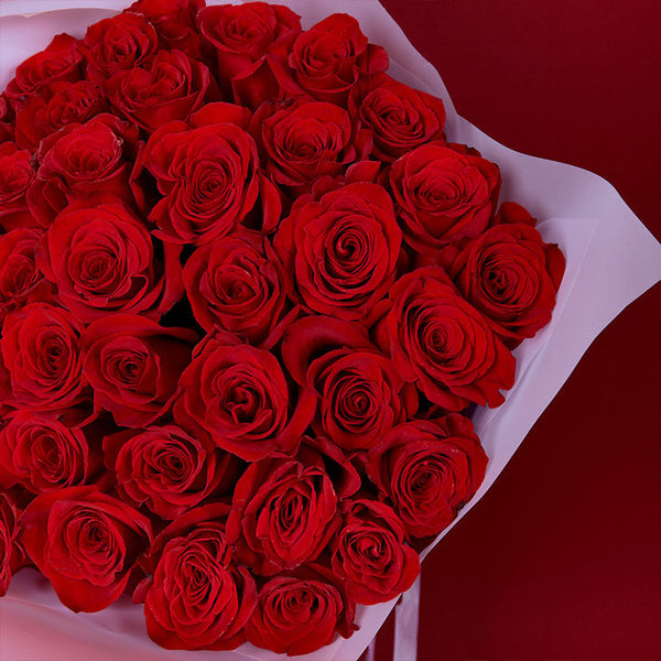 Pure Love: 50 Red Roses Bouquet | Shakespeare One Hour Free Delivery